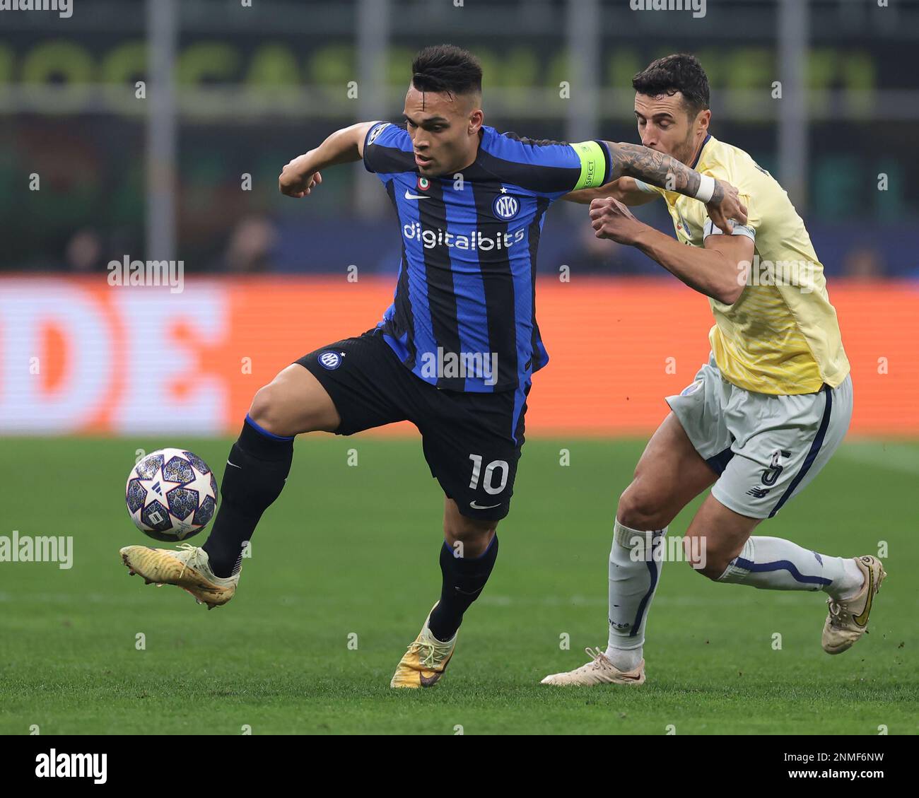 Milan, Italy, 22nd February 2023. Ivan Marcano of FC Porto tussles with ...