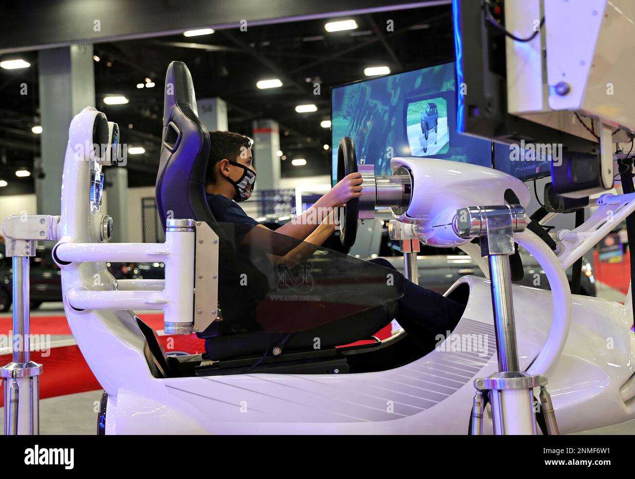Max Korenstein, 11 years old, sits in the Ford performance simulator at ...