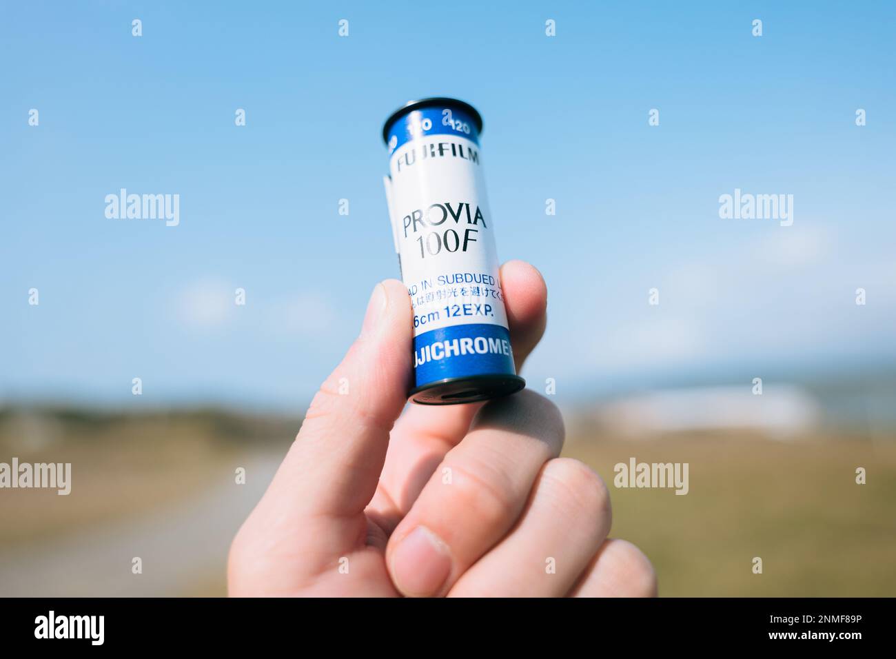 Hand helding reversal analog film Stock Photo - Alamy