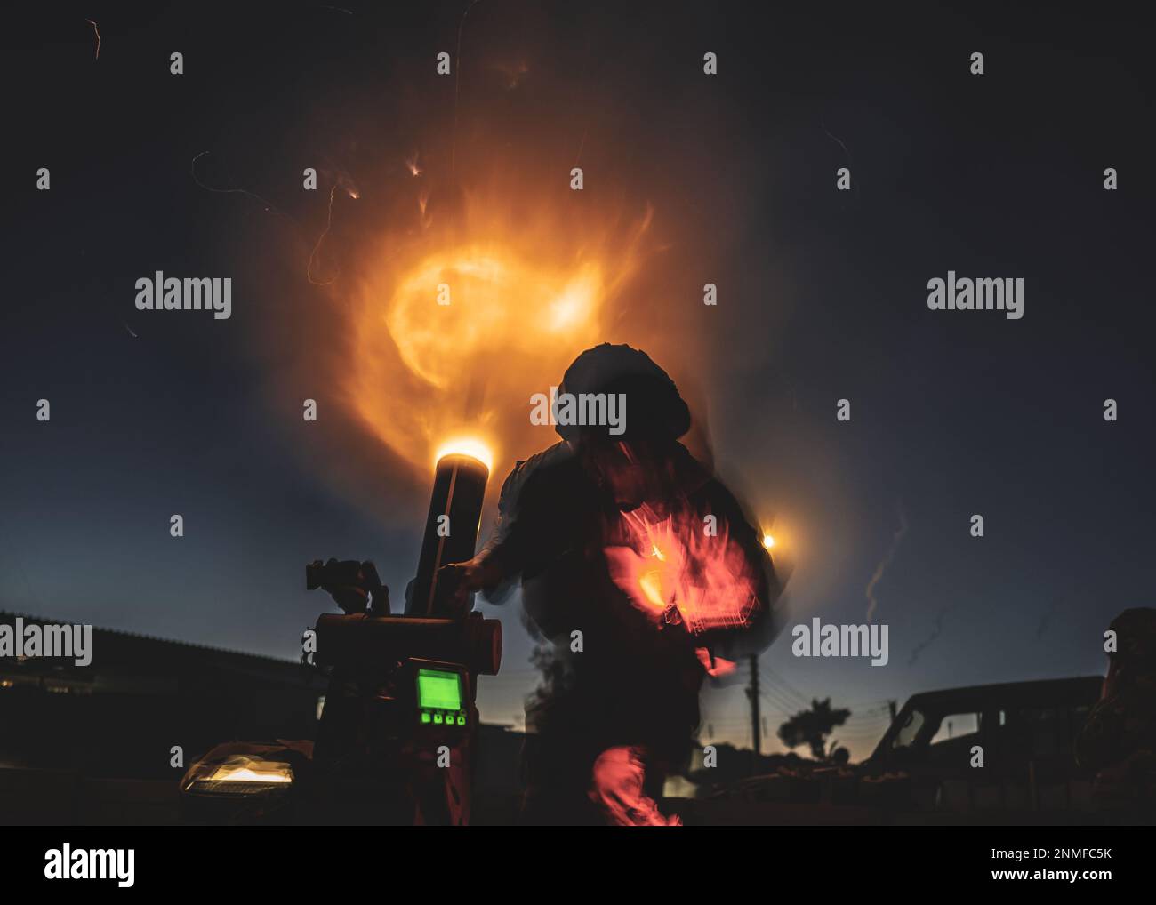 Coalition Forces fire a 120mm illumination mortar round during a live ...