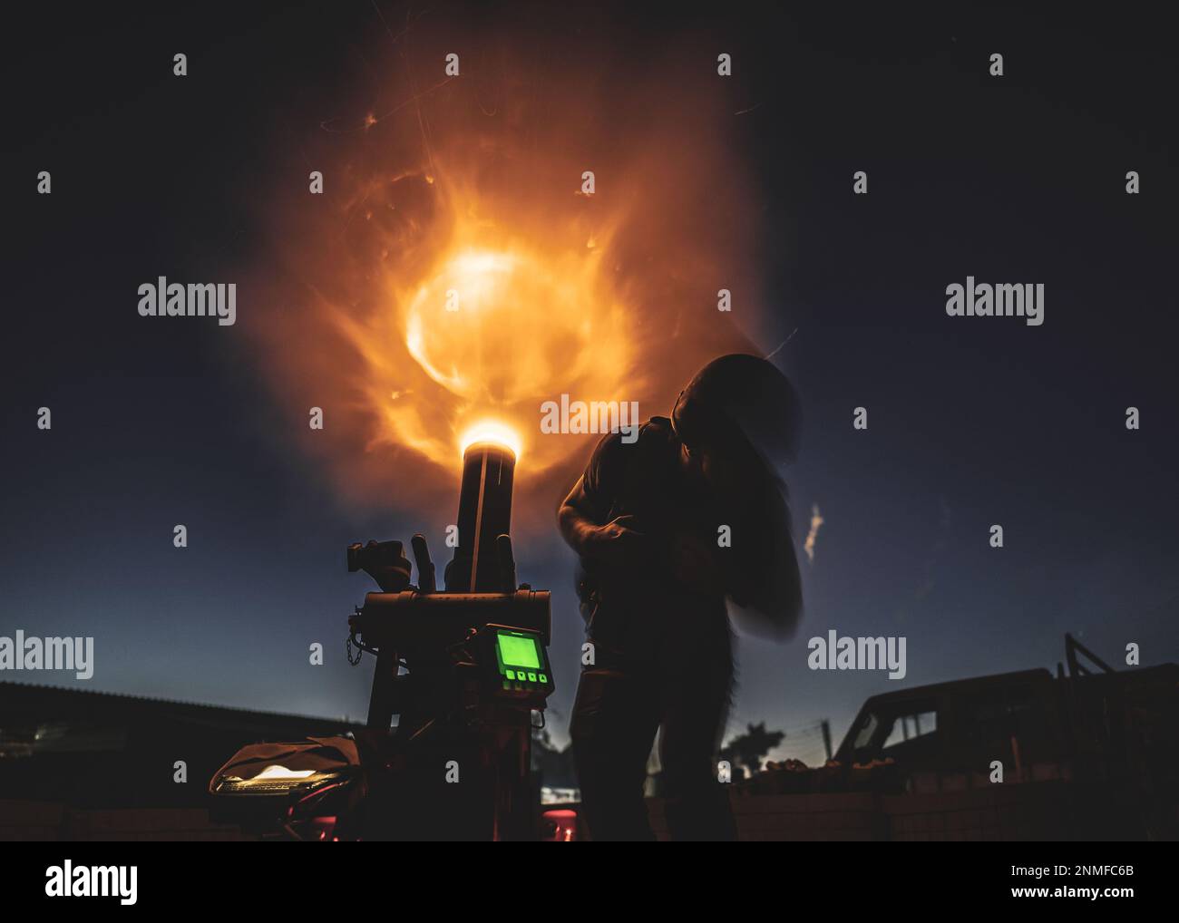 Coalition Forces fire a 120mm illumination mortar round during a live ...