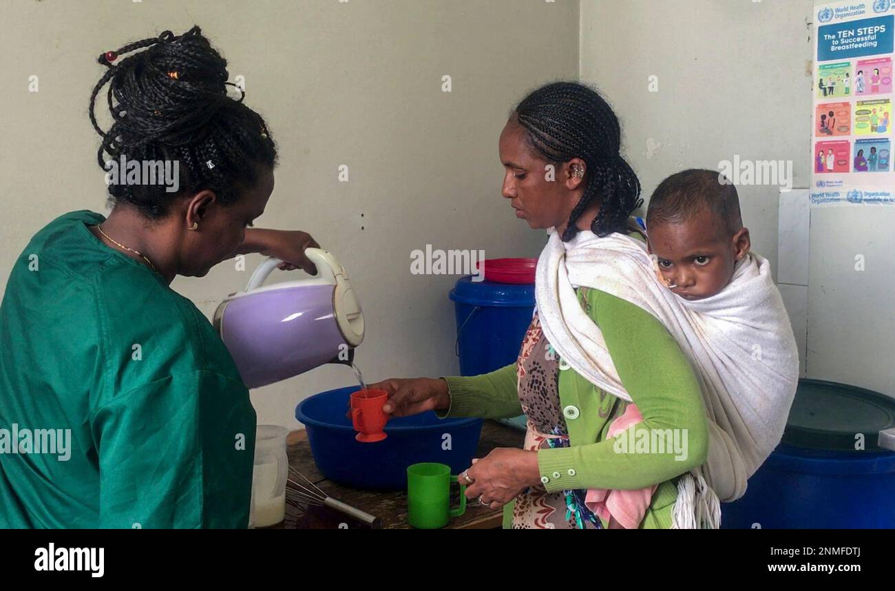 In this image made from video provided anonymously, Mizan Wolde carries ...
