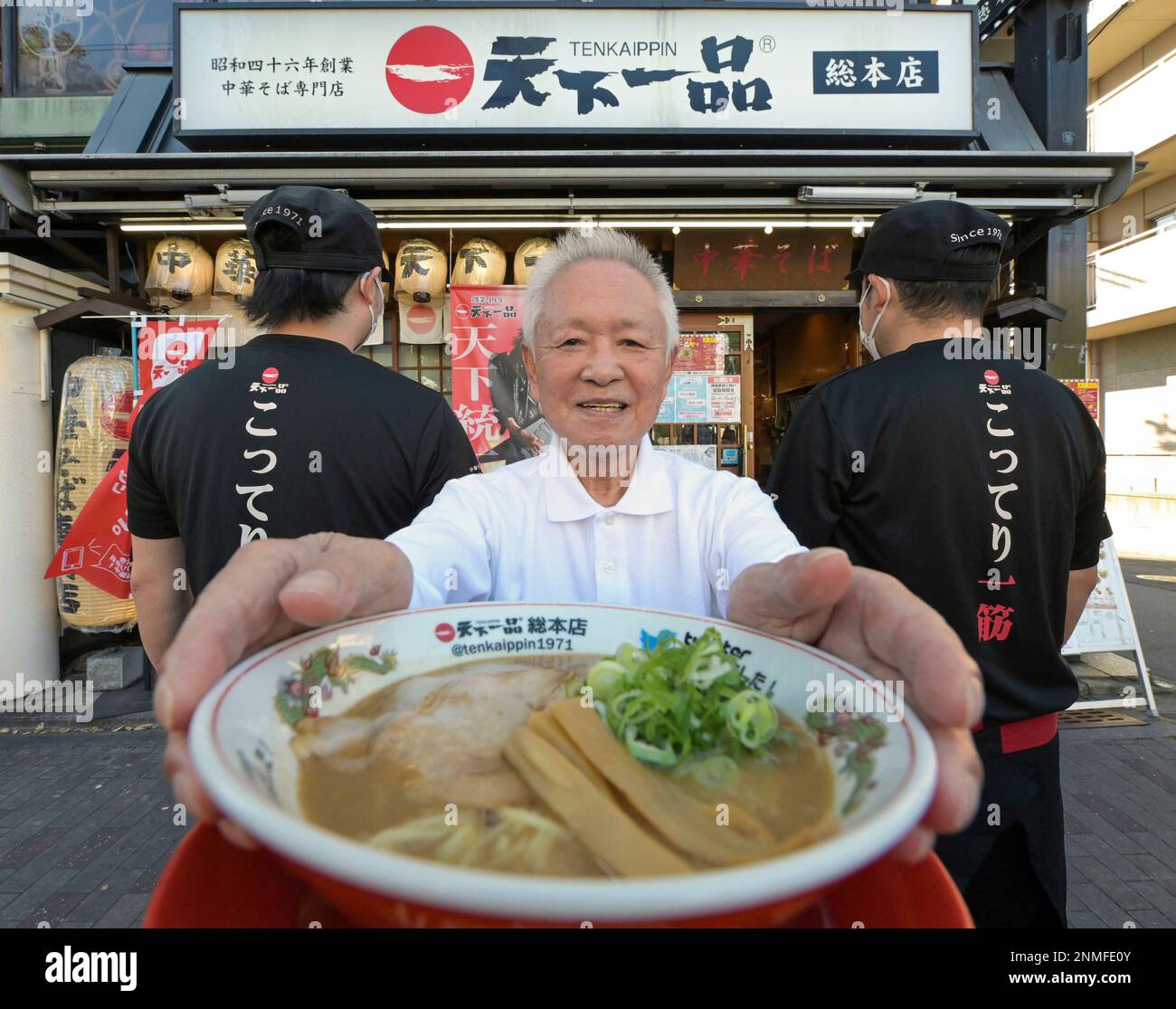 TsutomuKimura, the founder and the president of Tenkaippin, holds ...
