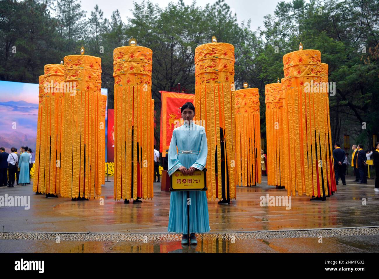 An usher waits in a ceremony honoring the mythological ancestor Huangdi ...