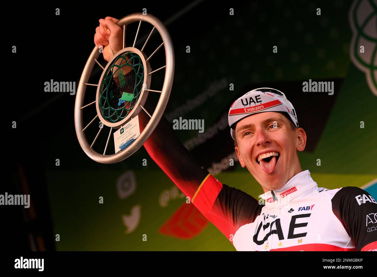 Tadej Pogacar celebrates on podium after winning the Como to Bergamo ...