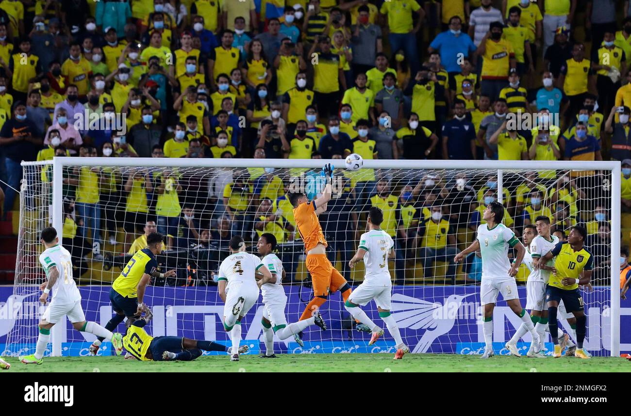 Bolivia's goalkeeper Carlos Lampe, center, clears the ball during a ...