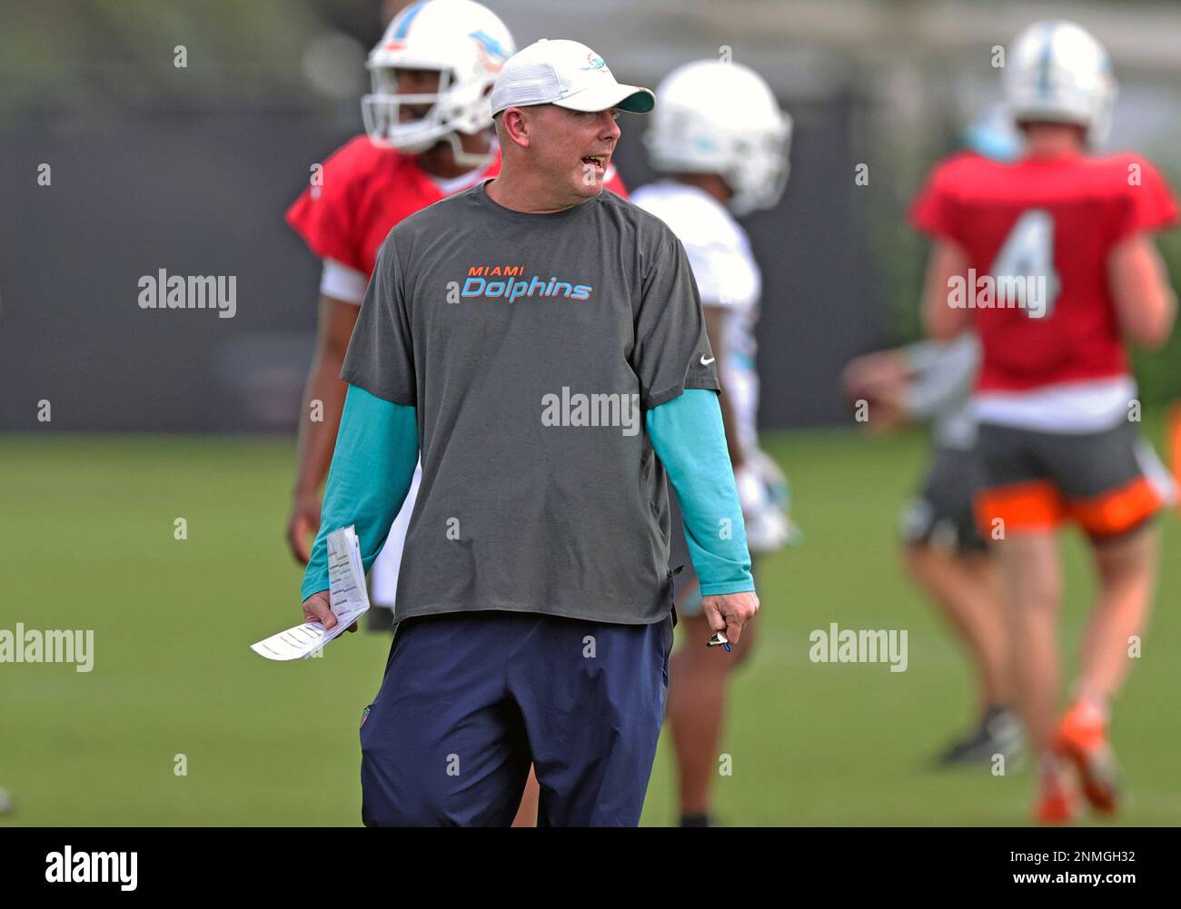 Miami Dolphins co-offensive coordinator George Godsey looks on during ...