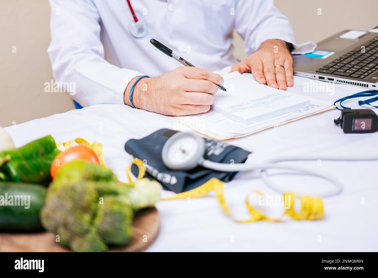 Nutritionist hands taking medical records in the office, Close-up of ...
