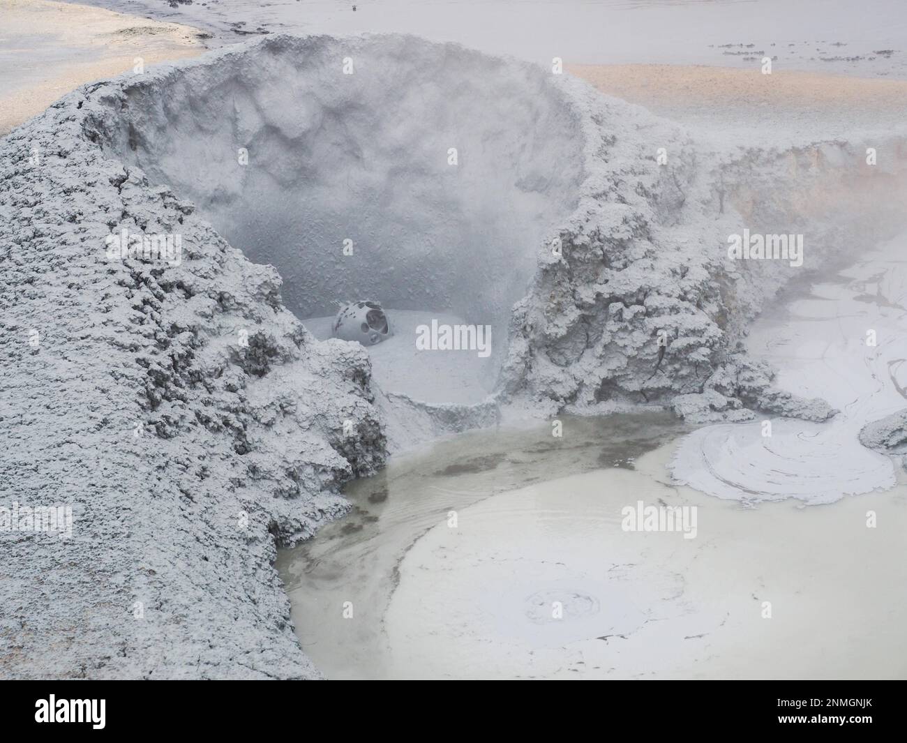 Smacking and bubbling mud springs, barren moon-like landscape ...