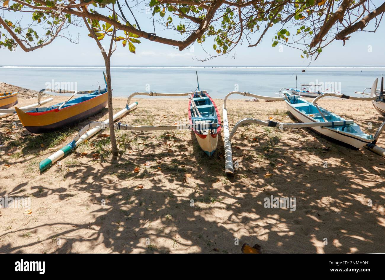 Fishing outriggers on the beach at Sanur, Bali, Indonesia Stock Photo ...