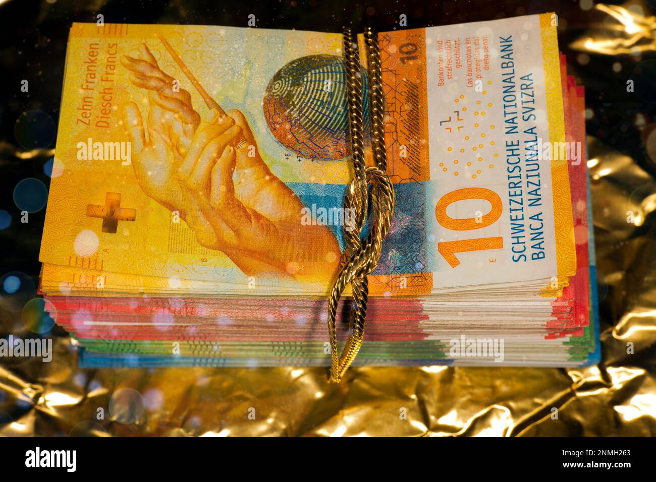 Symbol photo for black money in Switzerland, Swiss banknotes lying on a ...