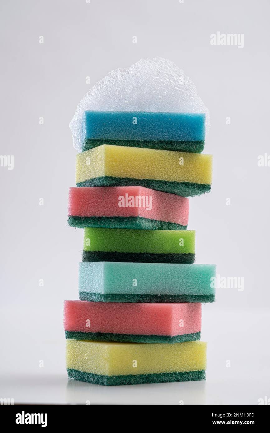 Lined up plaster sponges with foam Stock Photo - Alamy