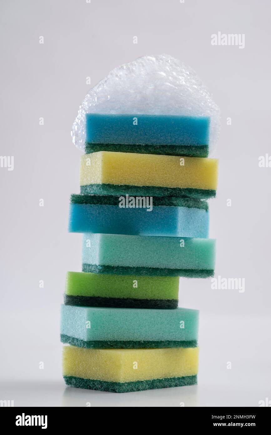Lined up plaster sponges with foam Stock Photo - Alamy