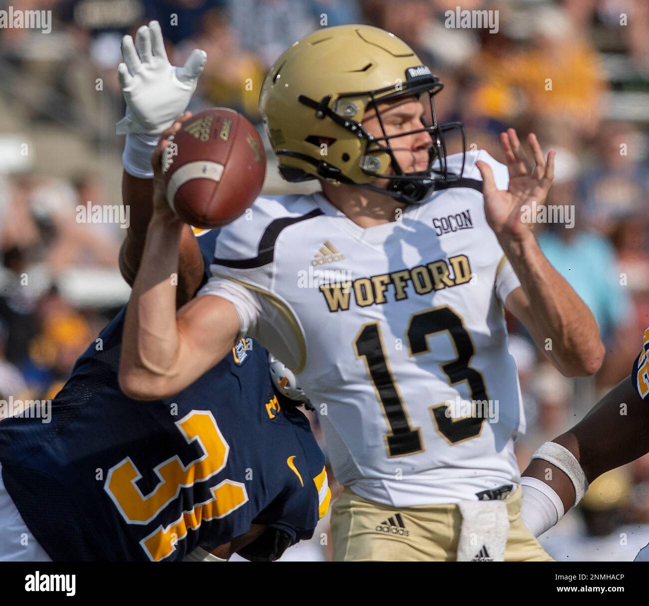 ETSU linebacker Jared Folks gets a hand on the ball just as Wofford ...