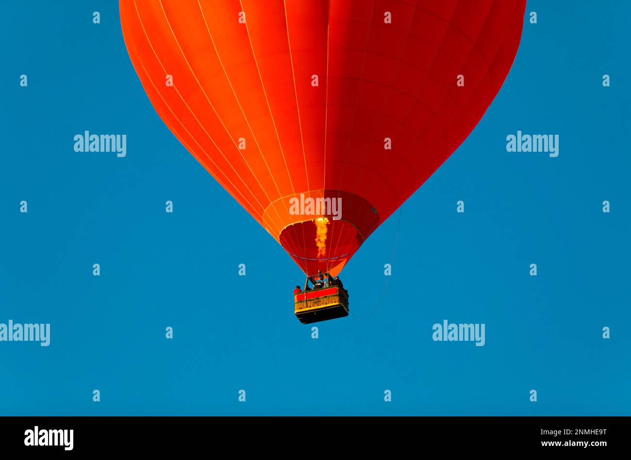 Rising hot air balloon Stock Photo - Alamy
