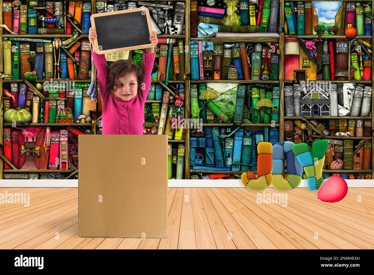Child in a box holding up a blackboard Stock Photo - Alamy