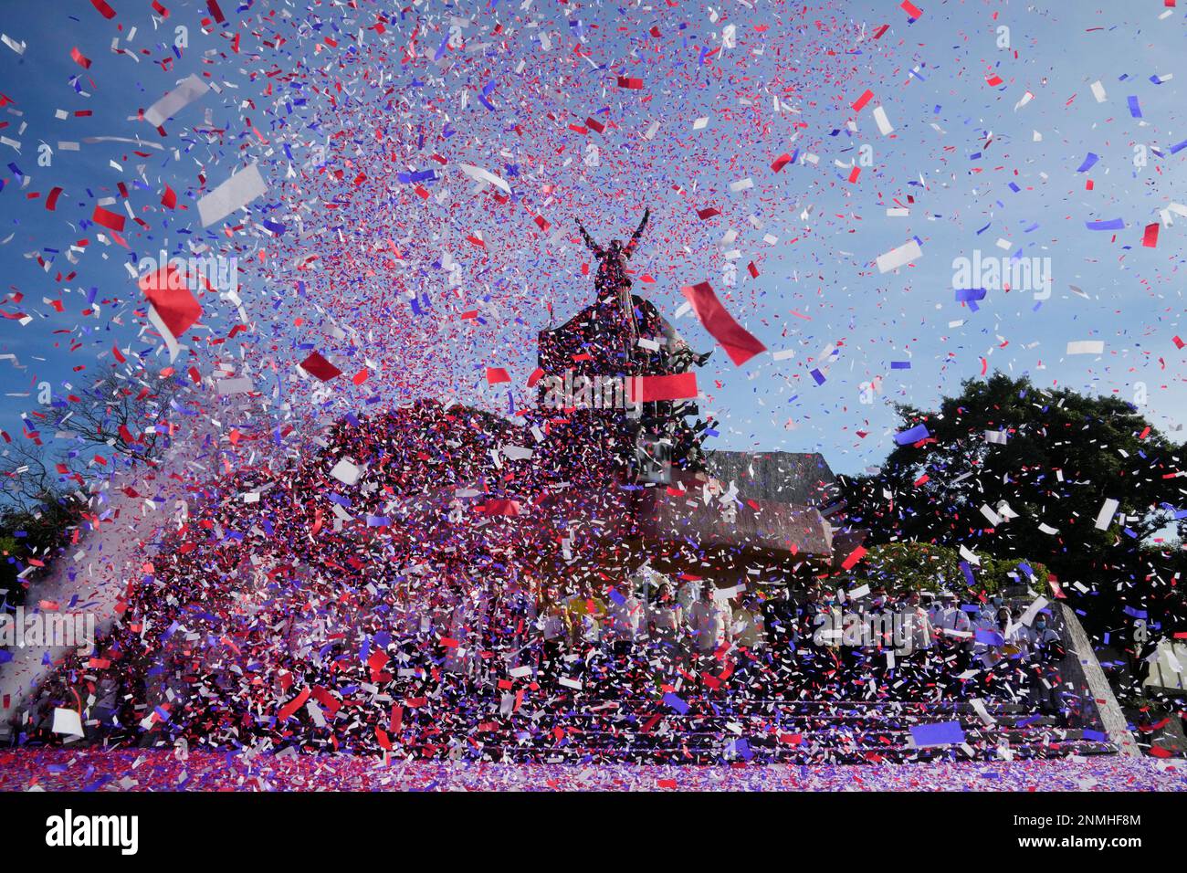 Confetti fall during ceremonies marking the 37th anniversary of the ...