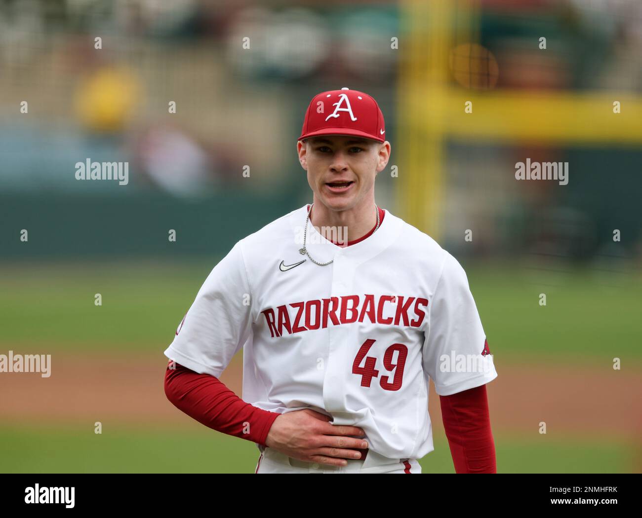 The Dug Out. 24th Feb, 2023. Razorback pitcher Cody Adcock #49 comes ...