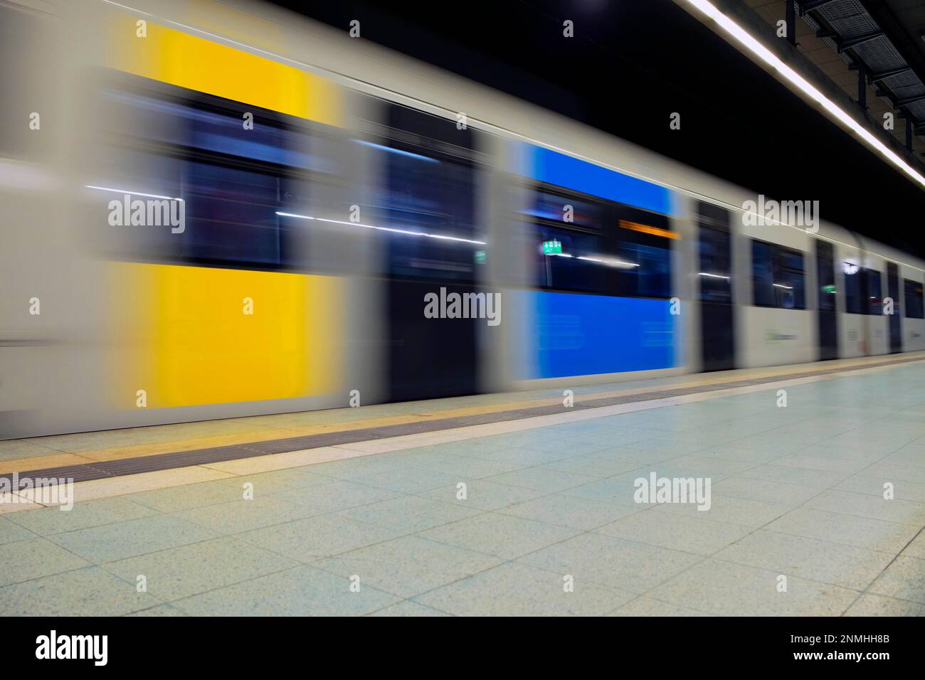 Arriving suburban train, new class 423 in light grey, currently causing ...