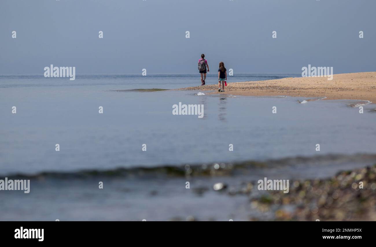 Mother and daughter walk on the beach - Cape Cod National Seashore ...