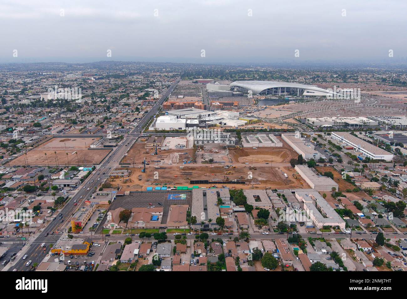 An aerial view of the Intuit Dome construction site with SoFi Stadium ...