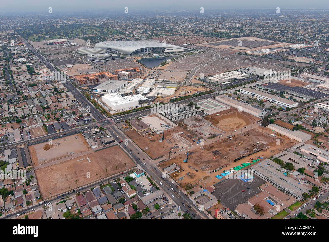 An aerial view of the Intuit Dome construction site with SoFi Stadium ...