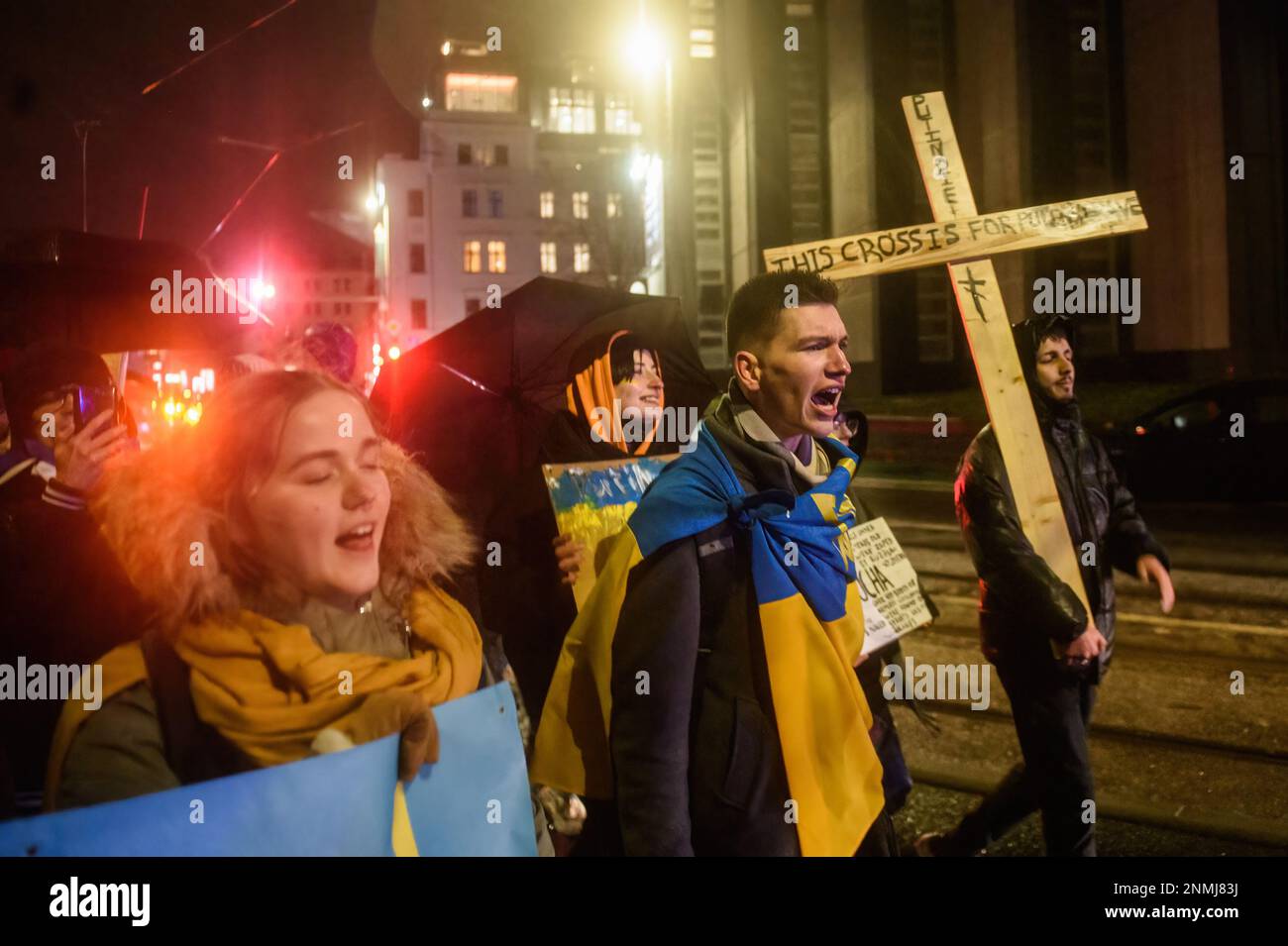Demonstrators chant slogans during an anti war rally to mark the first ...