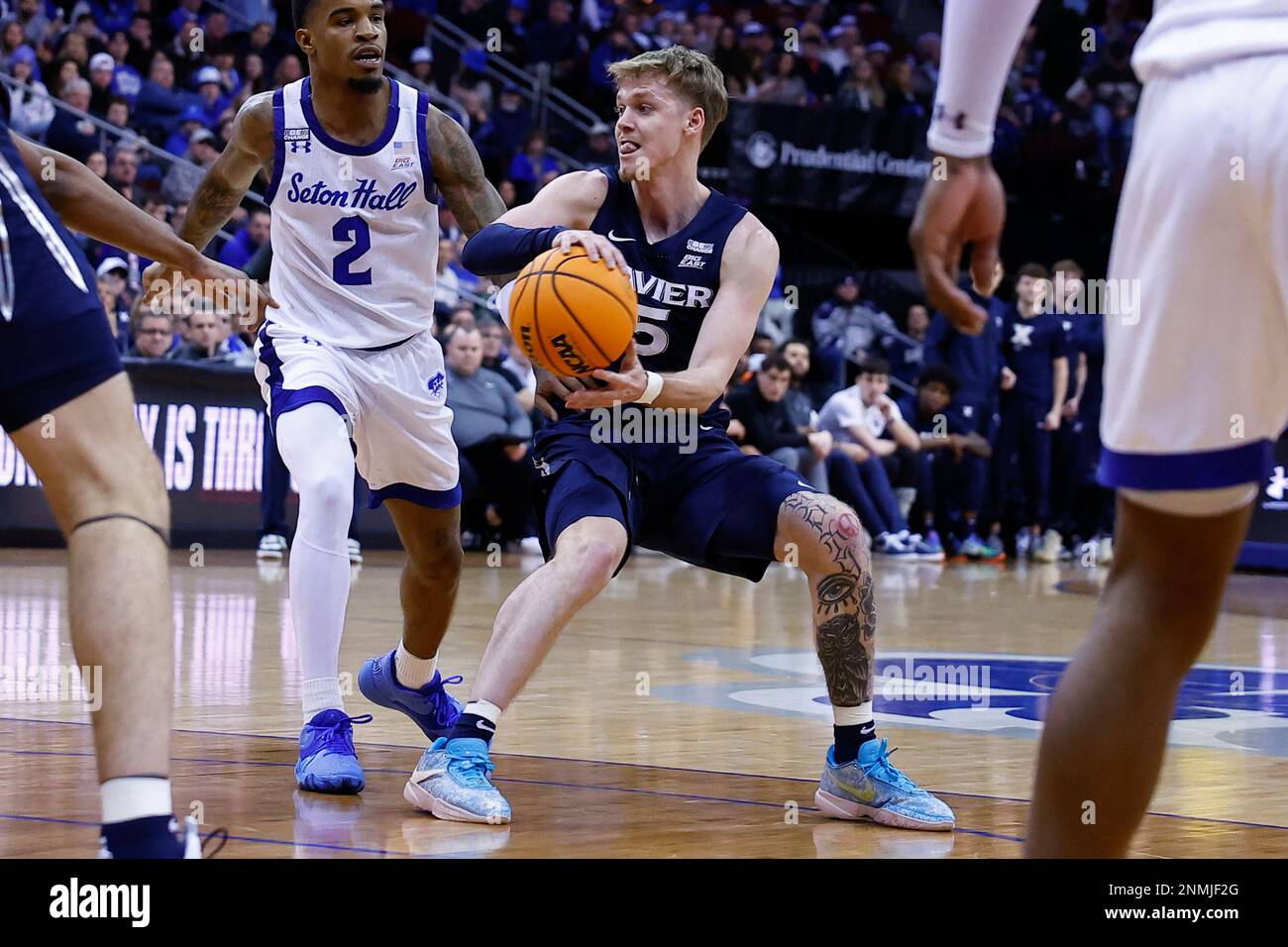 NEWARK, NJ - FEBRUARY 24: Adam Kunkel #5 of the Xavier Musketeers ...