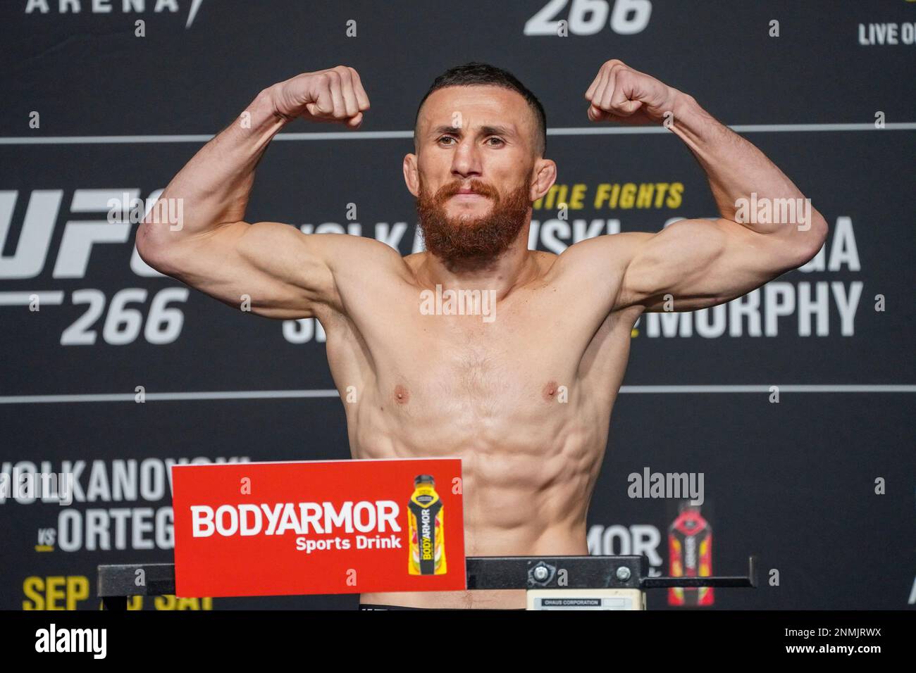 LAS VEGAS, NV - SEPTEMBER 24: Merab Dvalishvili steps on the scale for ...