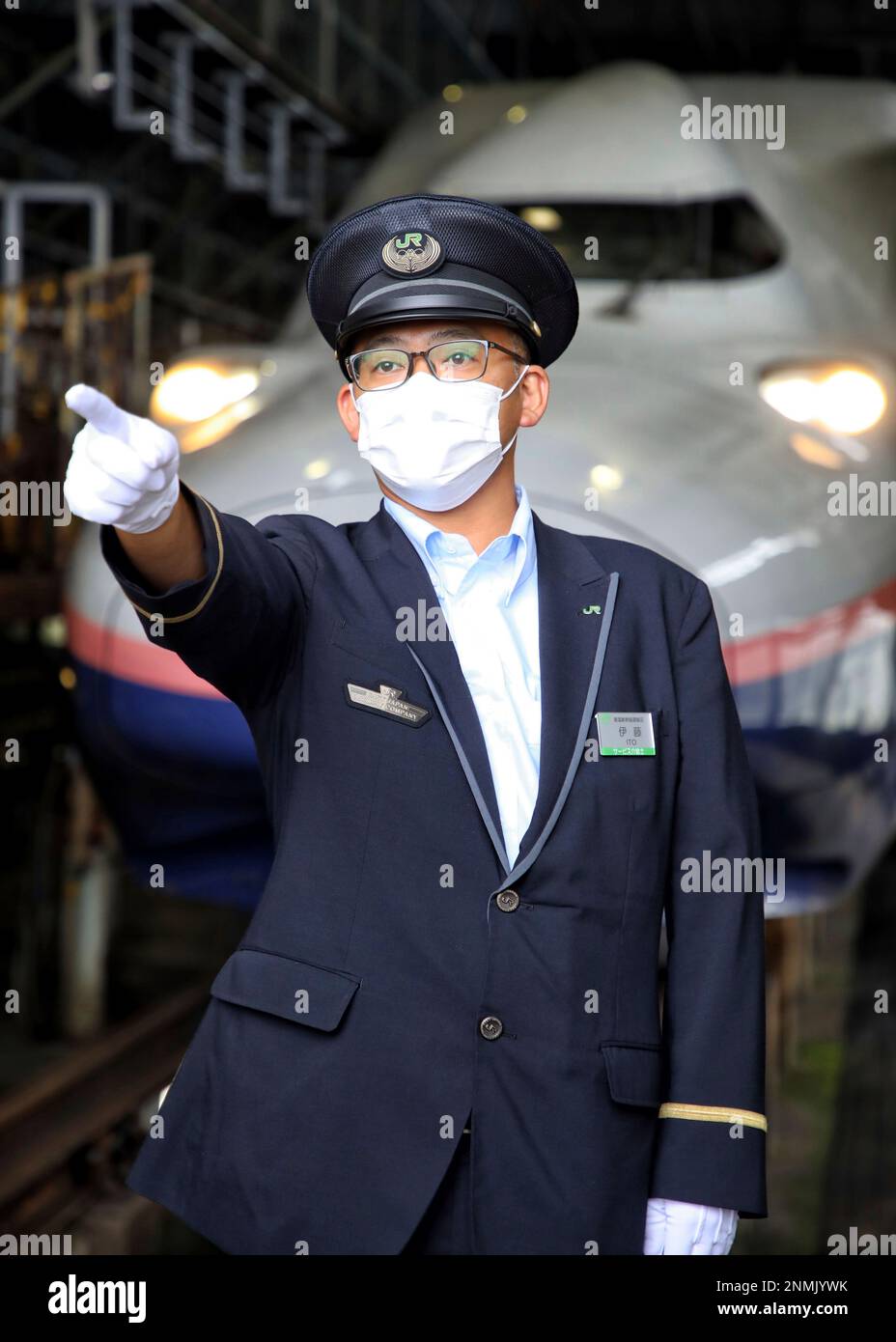 Osamu Toshima, a driver of the iconic double-decker bullet train E4 ...