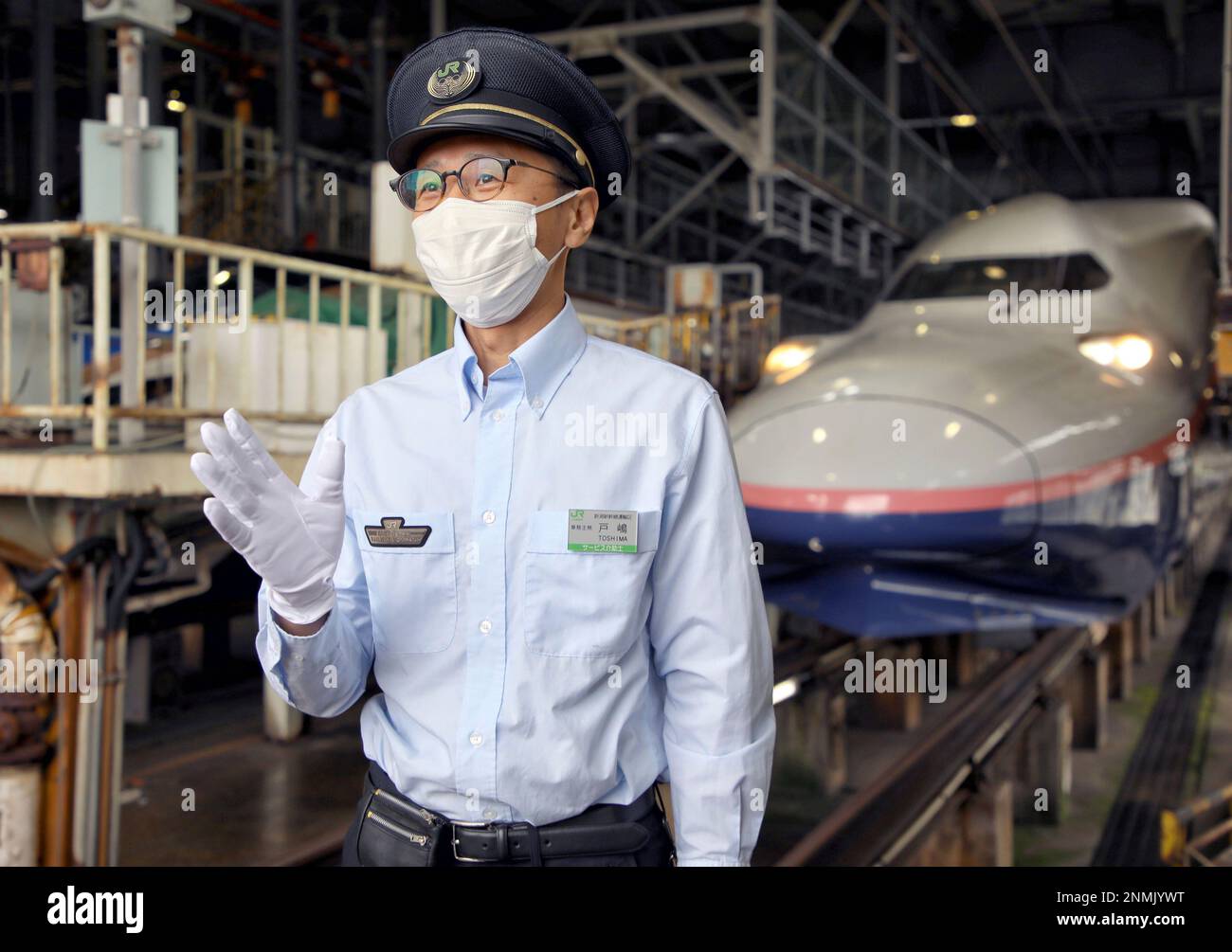 Osamu Toshima, a driver of the iconic double-decker bullet train E4 ...