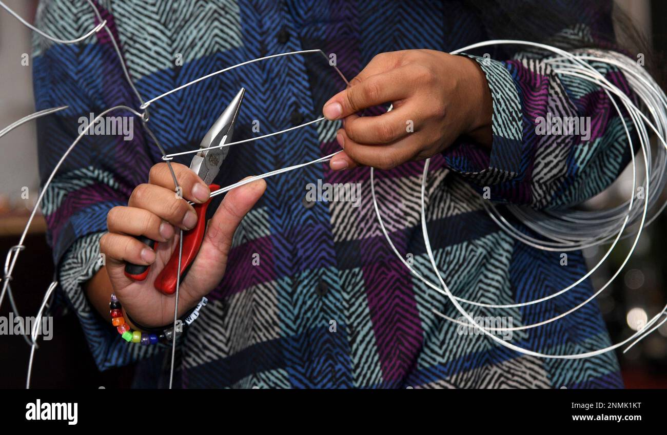 Baltimore street artist Reed Bmore makes wire sculptures of various ...