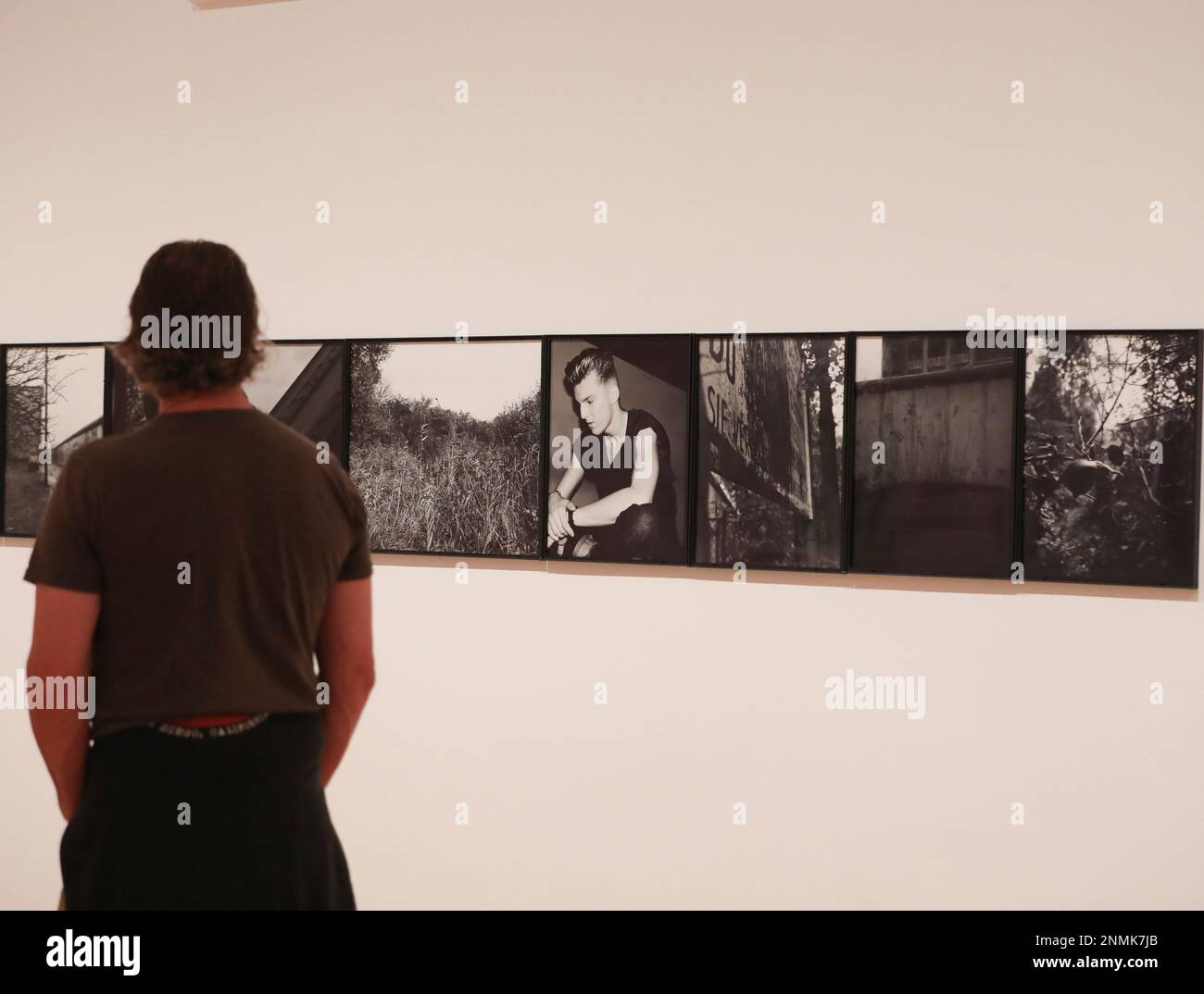 A man visits the exhibition 'Michael Schmidt. Photographs 1965-2014 ...