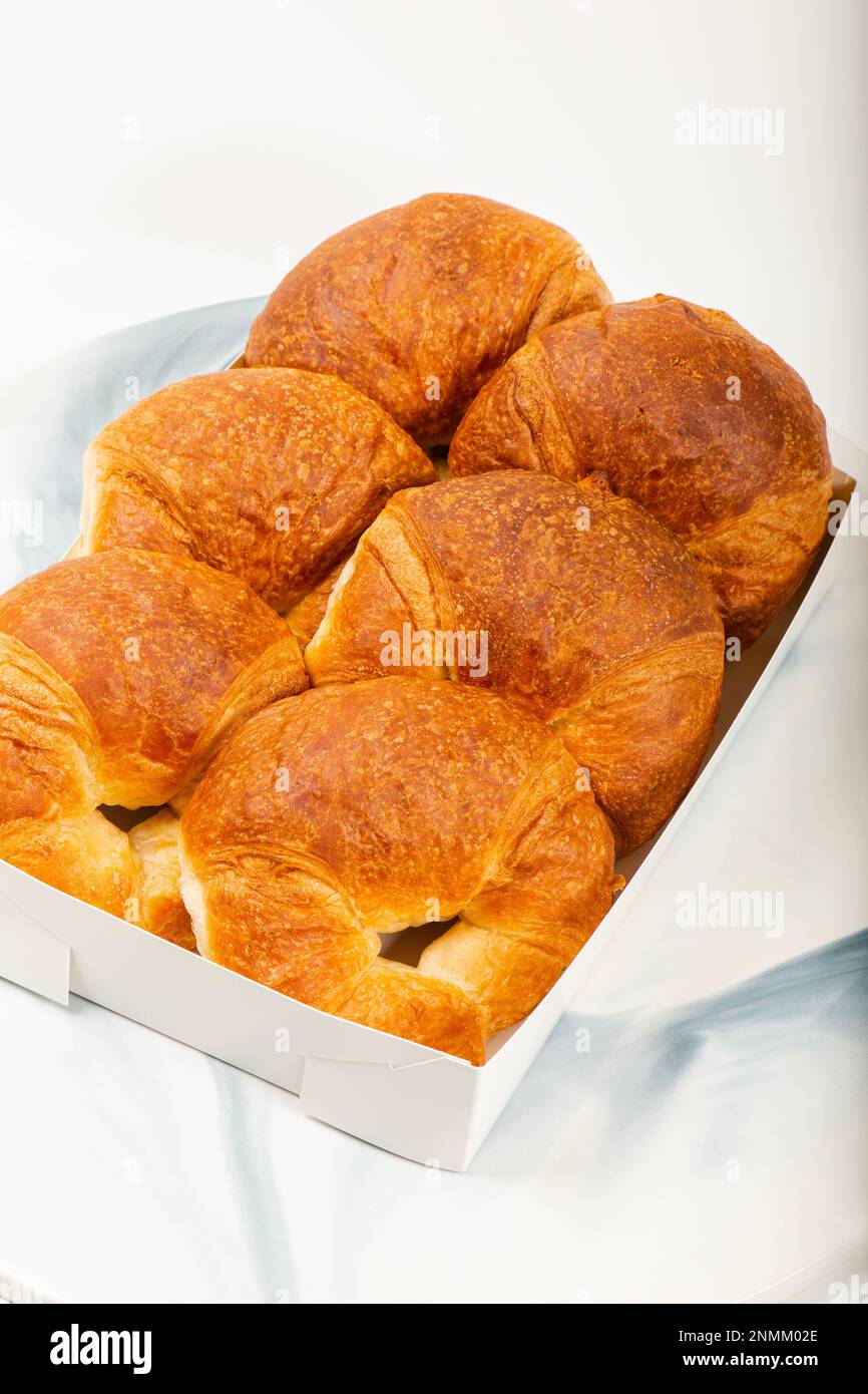 Freshly baked golden brown plain butter croissants Stock Photo - Alamy