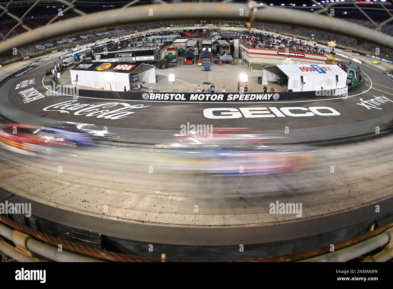 BRISTOL, TN - SEPTEMBER 17: Cars go through turn 1 at the NASCAR ...