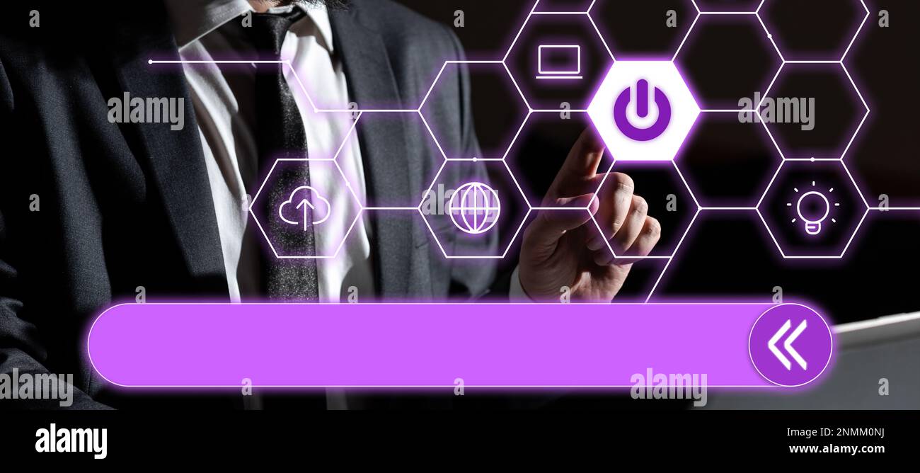 Businessman in office suit sitting at the table ant typing important ...