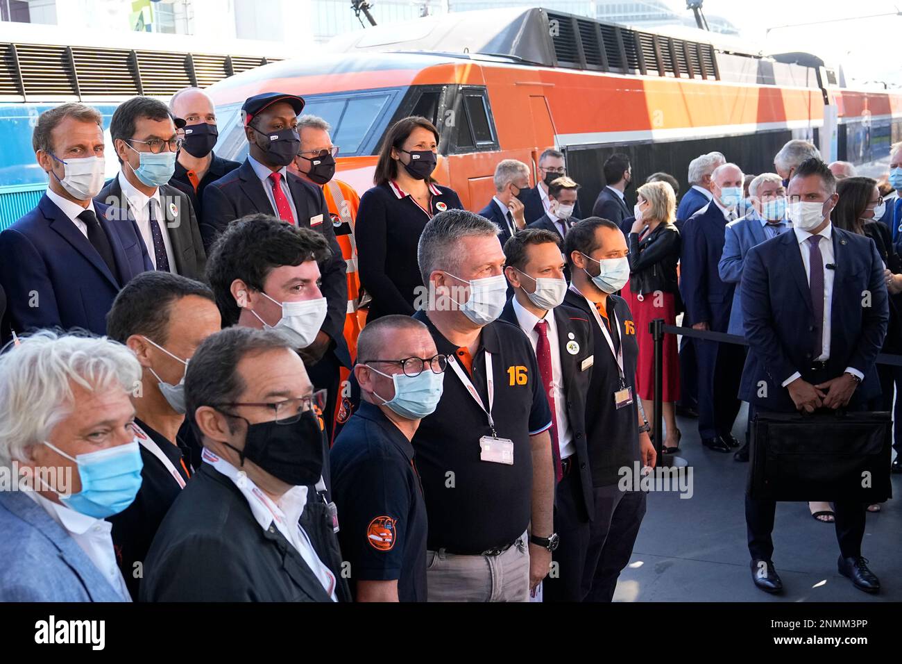 French President Emmanuel Macron, top left, and French railway operator ...
