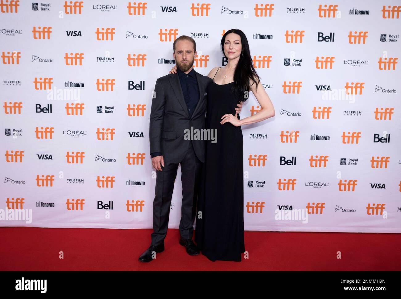 Actors Ben Foster and wife Laura Prepon pose for a photograph on the ...
