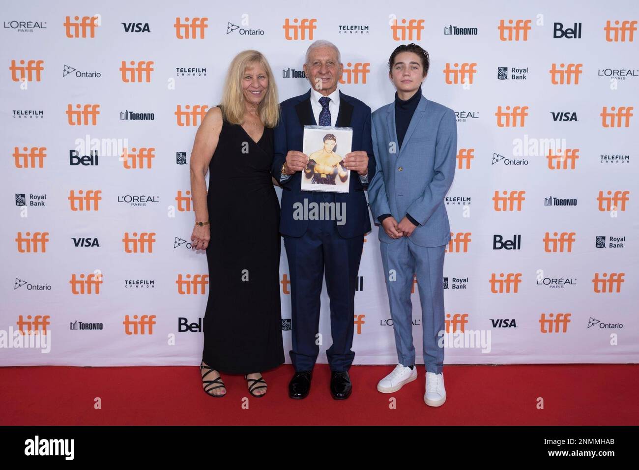 From left to right, Helene Stancato, Alan Scott Haft, holding a ...