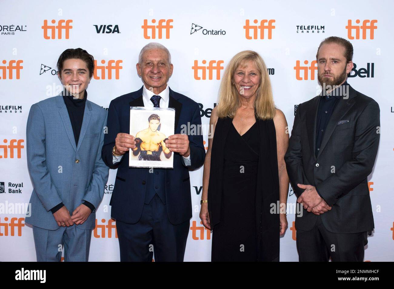 From left to right, actor Kingston Vernes, Alan Scott Haft, holding a ...