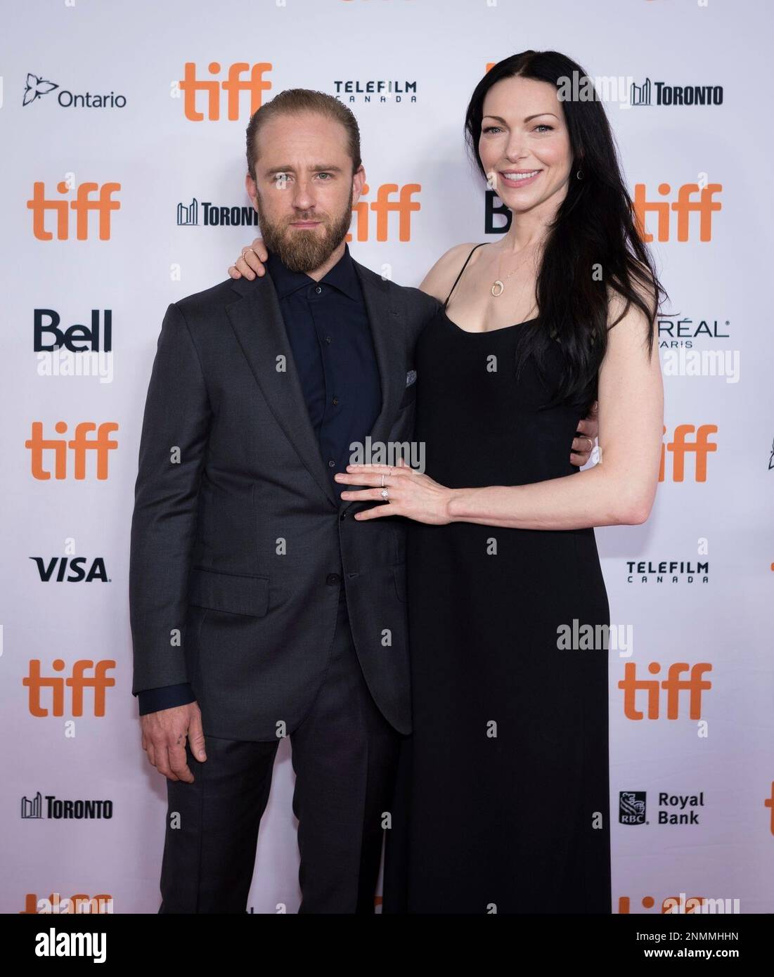 Actors Ben Foster and wife Laura Prepon pose for a photograph on the ...