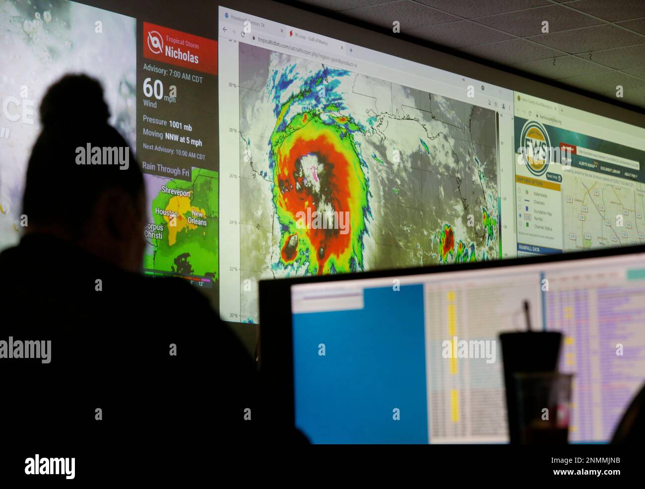 A Houston Police Department employee works at the city's emergency ...