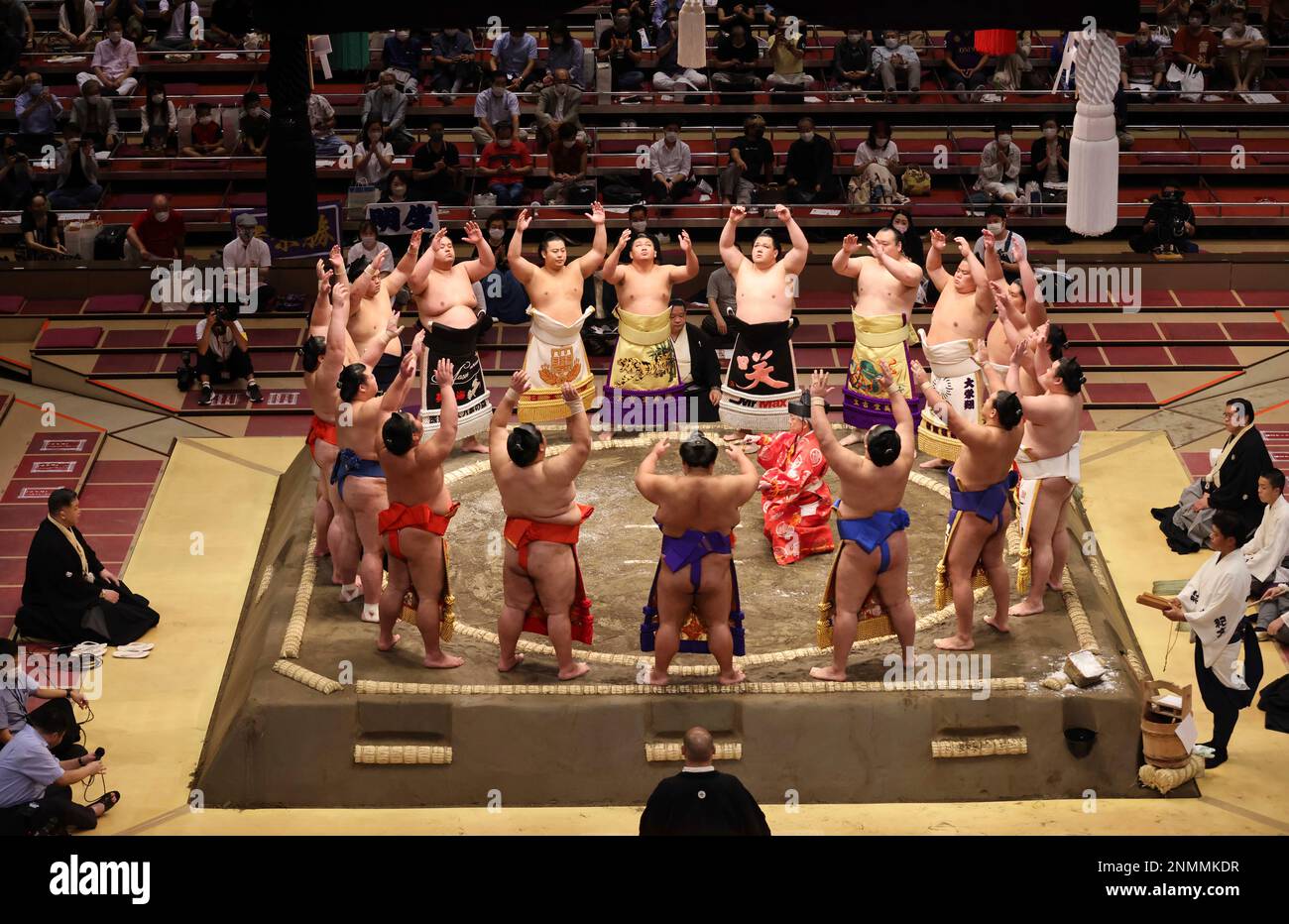 Grand sumo wrestlers, show their performance on a dohyo, ring at ...