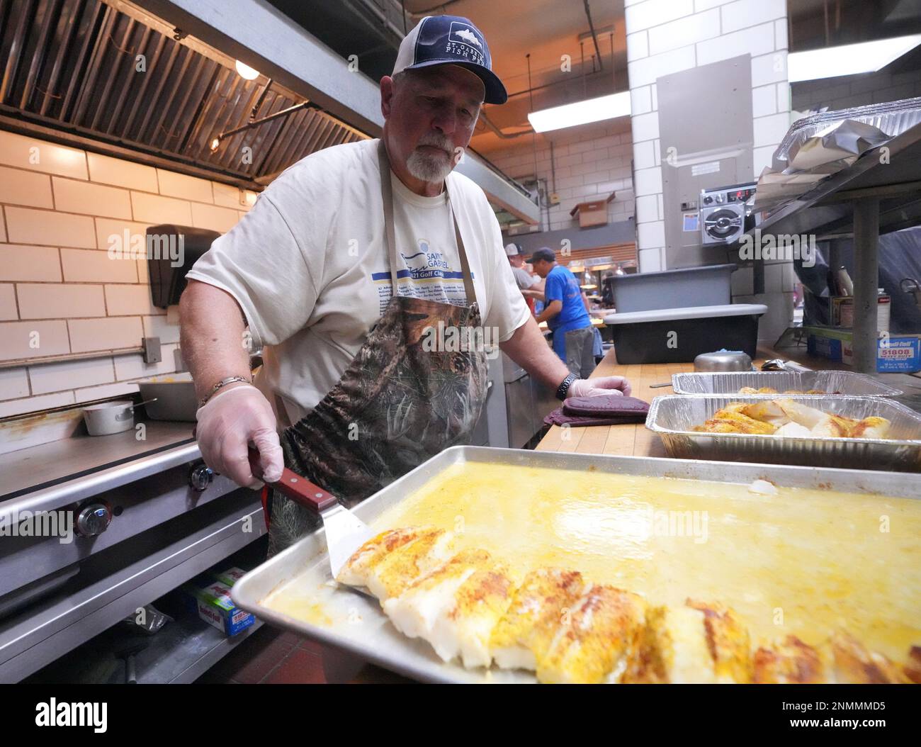 St. Louis, United States. 24th Feb, 2023. Chef Chris Wienhoff removes ...