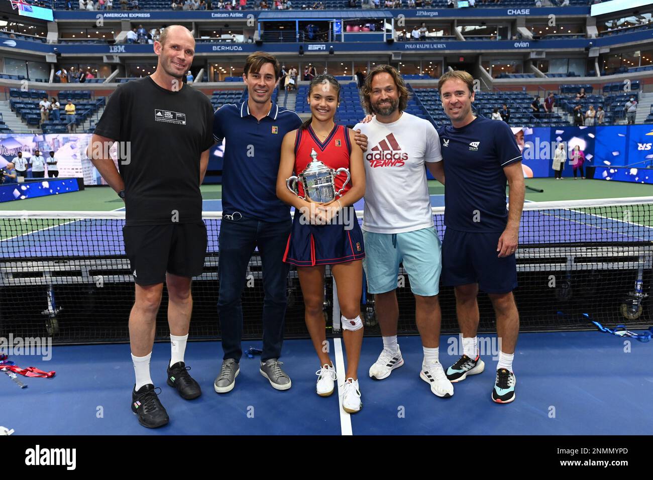 Women's Singles champion, Emma Raducanu poses for a photo with her coaching team at the 2021 US ...