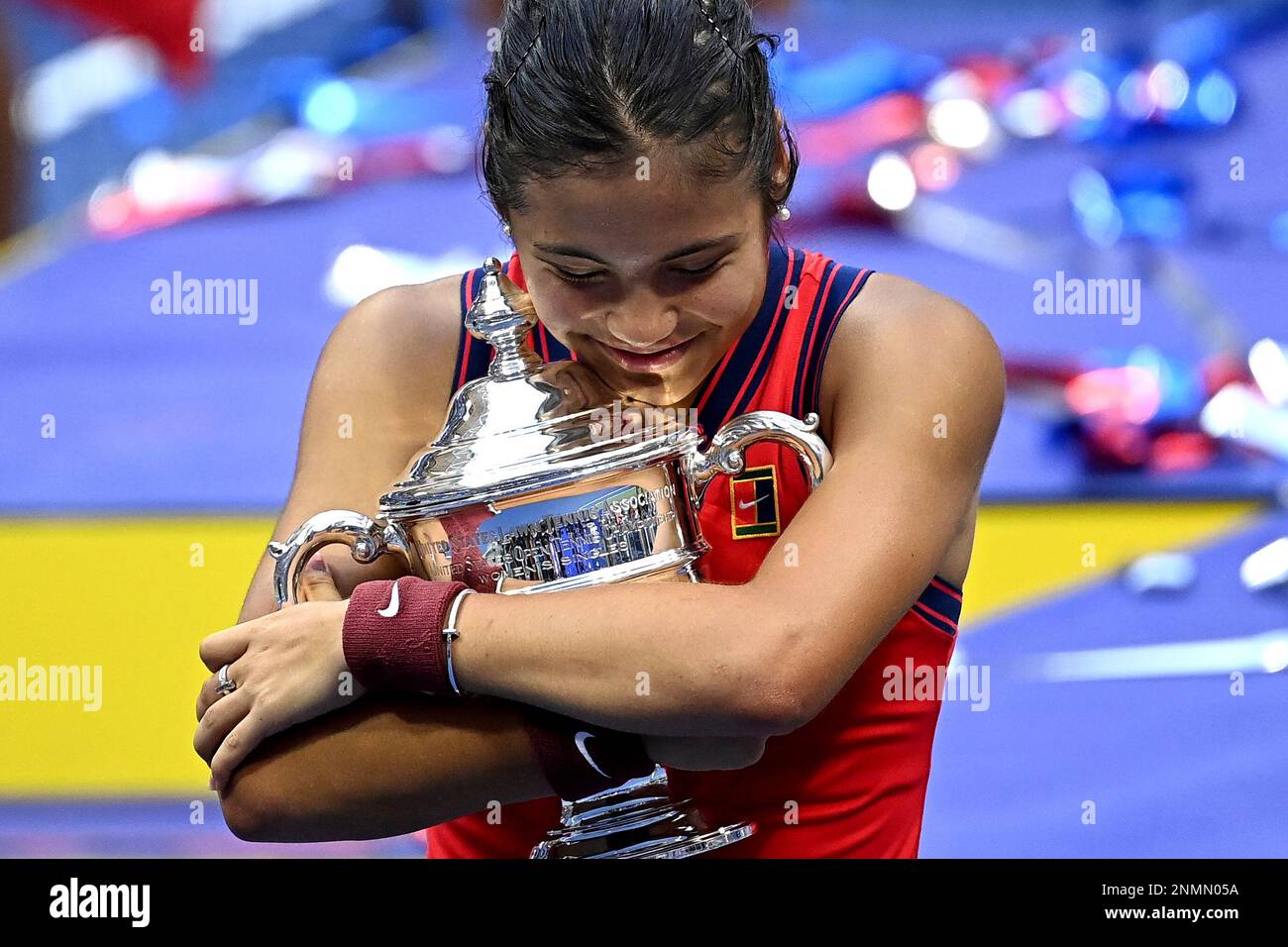 2021 US Open Women's Singles Champion Emma Raducanu hugs the trophy at ...