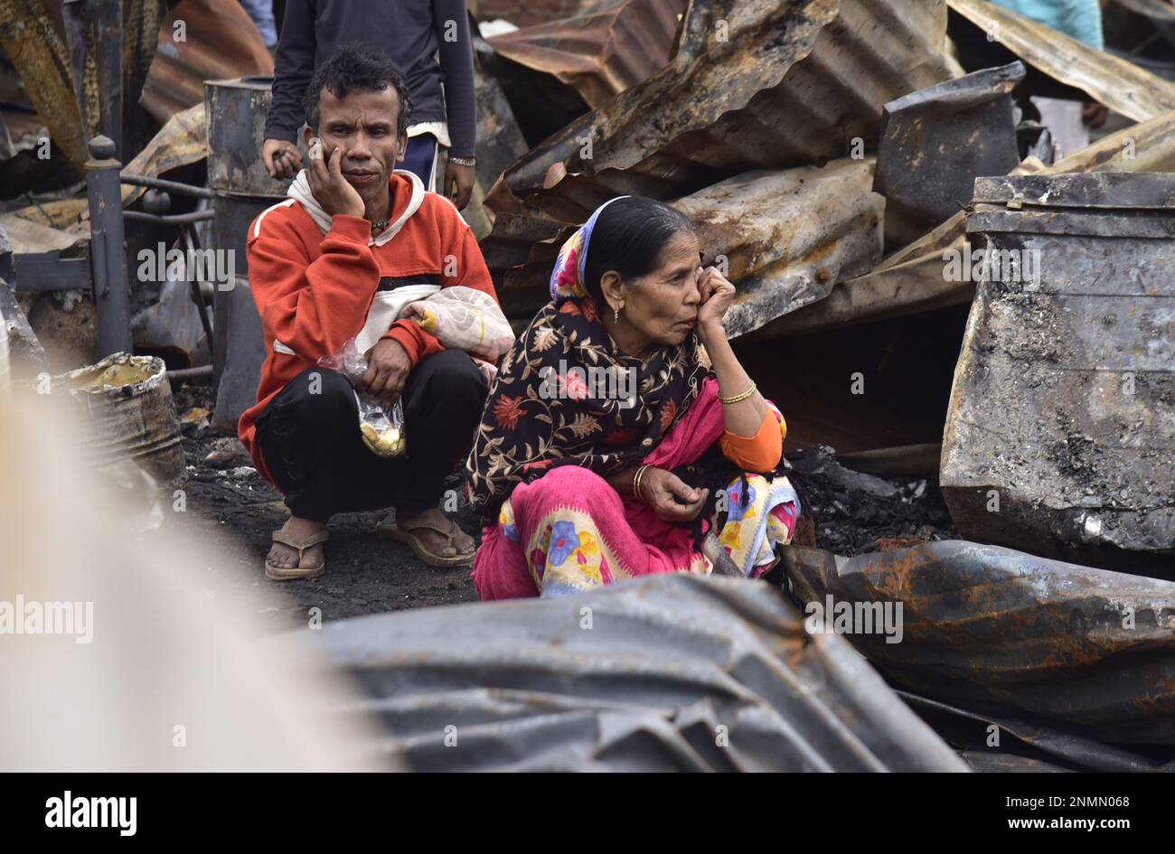 Guwahati, Guwahati, India. 24th Feb, 2023. A woman sit near her burn ...