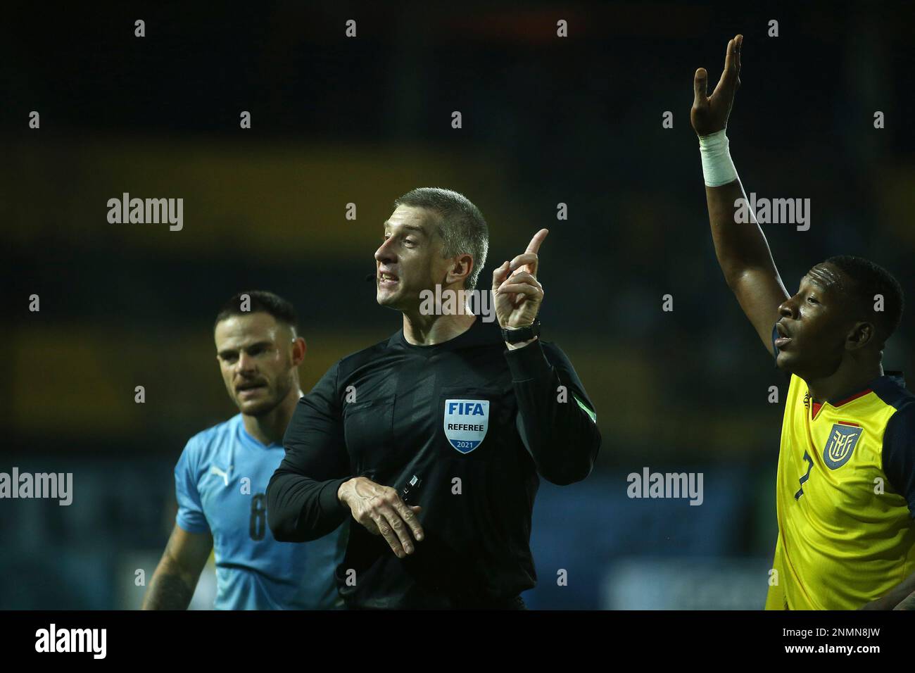 Referee Anderson Daronco gestures during a qualifying soccer match ...