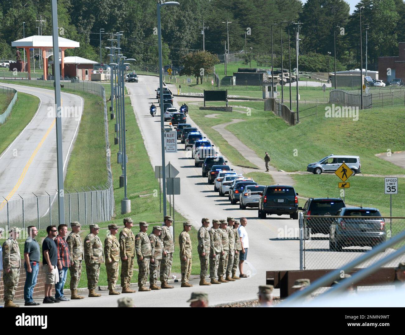 Army Staff Sgt. Ryan Knauss funeral procession moves toward the front ...