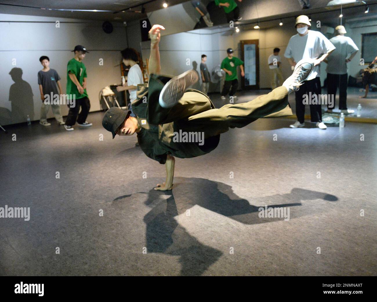 Members perform a breaking dance at a studio in Chuo Ward, Fukuoka ...